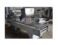 China Plastic Cup Sealer for Farms Chocolate Sauce Jelly Pudding Filling and Sealing Machine for sale