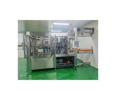 China 18 Heads Drinking Water Filling Machine with and Output up to 72 Bottles per Hour for sale