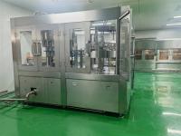 China 18 Heads Drinking Water Filling Machine with and Output up to 72 Bottles per Hour for sale