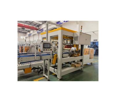 China Electric Driven Bottle Top Loading Carton Packing Machine with PLC Control Technology for sale