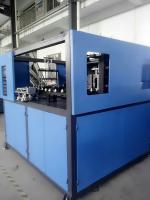 China 120BPH Electric Automatic PET Bottle Blowing Machine with Infrared Heating System and 12 Capping Heads for sale