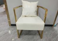 China Gold Plated Ergonomic Backrest Leather Upholstered Dining Chair With Armrests for sale