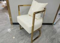 China Gold Plated Ergonomic Backrest Leather Upholstered Dining Chair With Armrests for sale