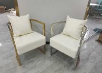 China Gold Plated Ergonomic Backrest Leather Upholstered Dining Chair With Armrests for sale