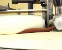 China Steamed Stuffed Bun Automatic Momo Making Machine Polished 304SS for sale