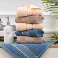 China Pure Cotton 32S Gold Wire Double Lattice Towel with Customer Logo Embroidery for sale