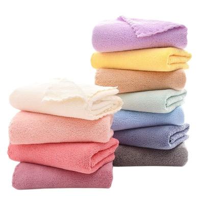 China Home Hotel Traveling Spa Soft and Absorbent Coral Velvet Children's Bath Towel 50*100 for sale