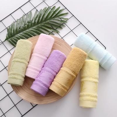 China Hot Jacquard Bamboo Fiber Towel 25*50cm for Soft and Absorbent Household Cleaning for sale