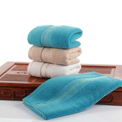 China Striped Pattern 100% Cotton Thickened Absorbent Towels Soft Skin Friendly Quick Drying for sale