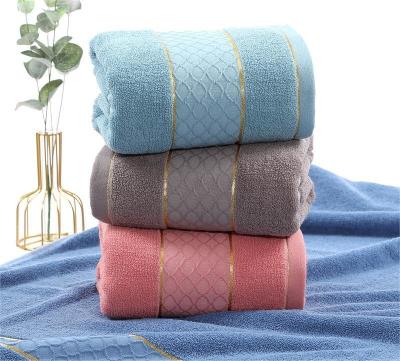 China Highly Absorbent 32S Cotton Towel with Gold Edge and Solid Color Cut Pile Pattern for sale