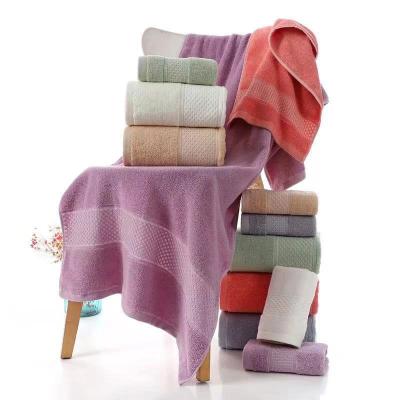 China Customizable Luxury Dark Plaid Bath Towel 70*140cm Simple and Fashionable Design for sale