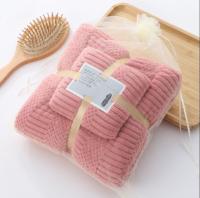 China Thick and Soft Coral Fleece Bath Towel Set Perfect for All Ages Auspicious Grid Design for sale