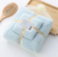 China Thick and Soft Coral Fleece Bath Towel Set Perfect for All Ages Auspicious Grid Design for sale
