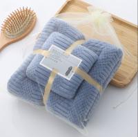 China Thick and Soft Coral Fleece Bath Towel Set Perfect for All Ages Auspicious Grid Design for sale