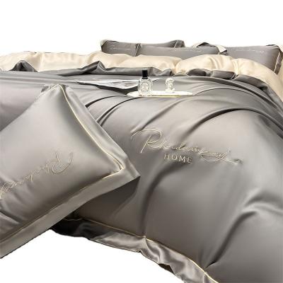 China Solid Color Light Luxury Washed Silk Embroidery 4 Pcs Bedding Set with Fitted Sheet for sale