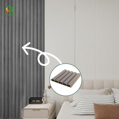 China Wood Grain 3D Embossed Hollow WPC Wall Panel for Indoor Outdoor Wall Application for sale