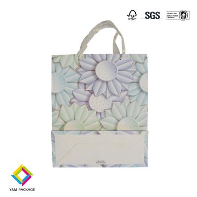 China Matte Lamination Surface Treatment Paper Shopping Bags - 180gsm-250gsm Coated Paper, Eco-Friendly Stand-Up Design for sale