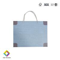China Custom Luxury Blue Color Gift Paper Bags with Ribbon Handle - 210g Art Paper Material, 1000 Units MOQ for sale