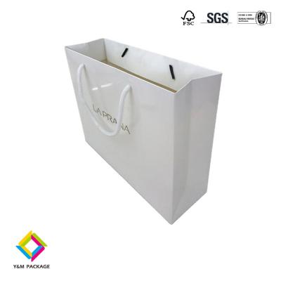 China FSC Recyclable Custom Kraft Paper Bags With Handle - 100-300gsm Material, 10-20 Day Lead Time For Retail Packaging for sale