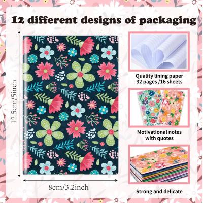 China Custom A5 Spiral Hardcover Notebook with Embossed Cover Lined and Dot-Grid Paper for sale