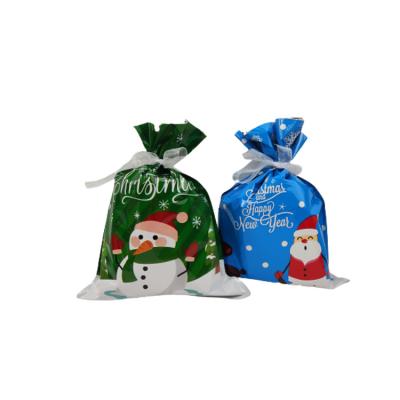 China Birthday Holiday Santa Drawstring Candy Small Gift Wrapping Bags With Ribbon Tie for sale