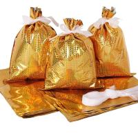 China Christmas Holiday Party Favor Plastic Foil Drawstring Gift Treat Bags Candy Goodies for sale
