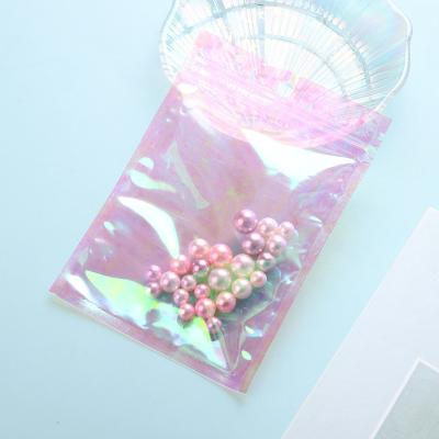 China Rainbow Film Laser Jewelry Plastic Symphony Transparent Zipper Bag Earring Sealed Bag for sale