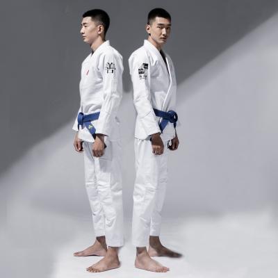 China Adults Kids BJJ GI Uniform 550gsm 450gsm White Jiu Jitsu Gi Customized for sale