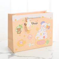 China Cattle Paperboard Custom Kraft Paper Handbag Cosmetics Packaging Gift Bags With Cowhide Rope for sale