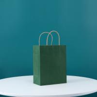 China Vertical 130gsm Custom Kraft Paper Bags With Twisted Handles for sale
