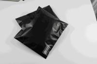 China Custom Printed Biodegradable Self Sealing Courier Bags In Black for sale