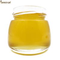 China Pure Raw Honey Nature Fruitwood Flower Honey No Addictive Bright Yellow Color 100% Ntatural Bee Honey for sale