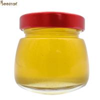 China Pure Raw Honey Nature Fruitwood Flower Honey No Addictive Bright Yellow Color 100% Ntatural Bee Honey for sale