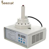 China Mini Manual Electromagnetic Induction Sealing Machine with 100-500W Adjustable Power and Copper Coil for 20-130mm Applicable Caliber for sale