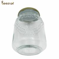 China EU Style Honey Jar 746ml Honey Packaging Glass Storage Jar With Mental Lid for sale
