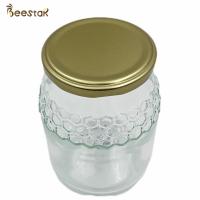 China EU Style Honey Jar 746ml Honey Packaging Glass Storage Jar With Mental Lid for sale