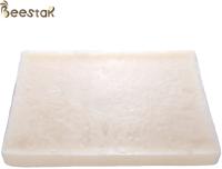 China Food Grade Pure Beeswax Block with Melting Point 62~67℃ Packed in 25Kgs Cartons for Candle Making for sale