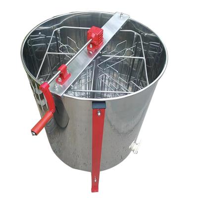 China 4 Frame Stainless Steel Manual Honey Extractor With Inner Baskets Extract Honey From Honeycomb In Two Directions for sale