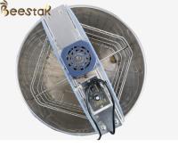 China 4 Frames Electric Stainless Steel Honey Extractor with Stands and Honey Gate, Plastic Lid for sale
