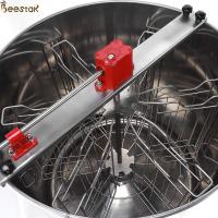 China 6 Frames Stainless Steel Manual Honey Extractor Hand Crank Extractor With Legs for sale