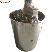 China 4 Frames Stainless Steel Electric Honey Extractor With Stands And Honey Gate for sale