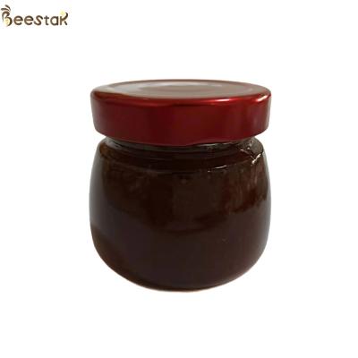 China Beestar Organic Bulk Raw Unfiltered Black Honey 100% Pure No Additives Natural Honey Glass Jar For Baking Cooking Mature for sale