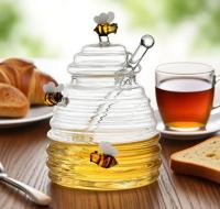 China 450ml Transparent Food Grade Glass Honey Pot with Stirring Rod and Bees Storage Jar for sale