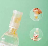 China Premium 350ml PET Honey Water Bottle with Honey Cap - Empty Portable Container for Honey Beverage Packaging for sale