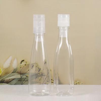 China Premium 350ml PET Honey Water Bottle with Honey Cap - Empty Portable Container for Honey Beverage Packaging for sale
