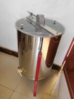 China 4 Frame 304 Stainless Steel Manual Control Speed Honey Extractor With Metal Legs for sale