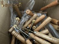 China Wooden Handle Wheel Embedder with Small Gear for Bee Hive Equipment in Copper Material for sale