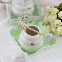 China Wholesale White Empty Honey Jar Ceramic Honey Pot with wooden dipper for honey storage for sale