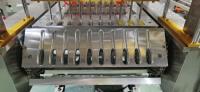 China Spoon Type Honey Packaging Machine 10-12 Head Automatic Honey Filling Machine for sale