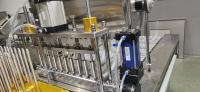 China Spoon Type Honey Packaging Machine 10-12 Head Automatic Honey Filling Machine for sale